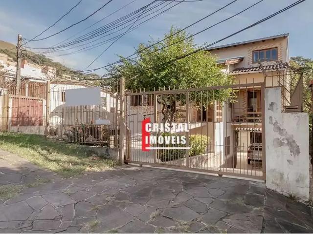 Casa / Sobrado para Venda em Porto Alegre/RS Coronel Aparício Borges 5 Quartos