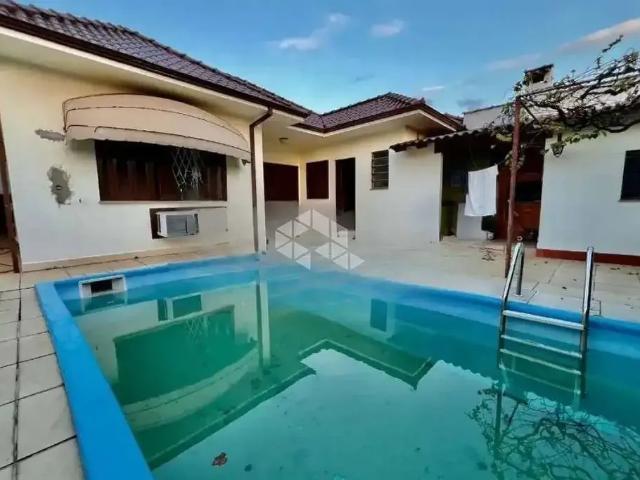 Casa / Sobrado para Venda em Porto Alegre/RS Cristo Redentor 3 Quartos