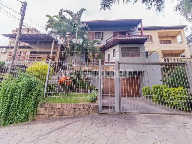 Casa / Sobrado para Venda em Porto Alegre/RS Cristo Redentor 6 Quartos