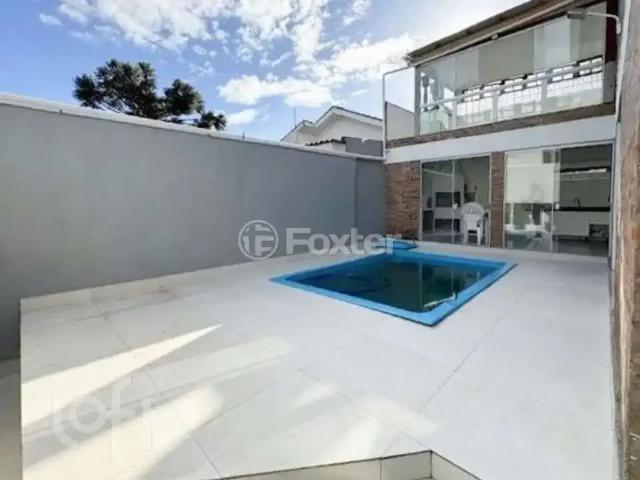 Casa / Sobrado para Venda em Porto Alegre/RS Cristal 4 Quartos