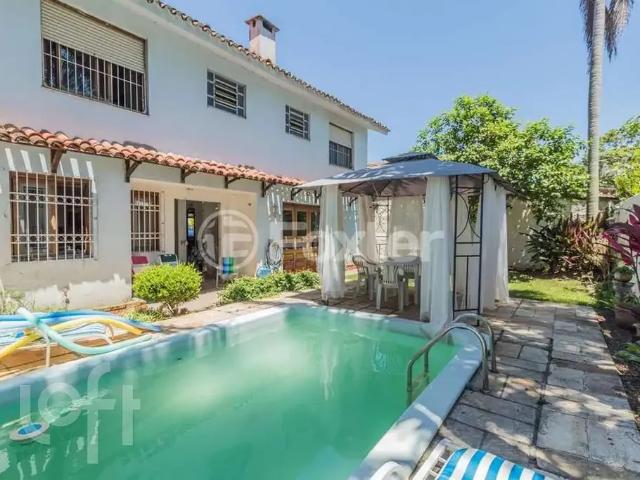 Casa / Sobrado para Venda em Porto Alegre/RS Cristal 4 Quartos