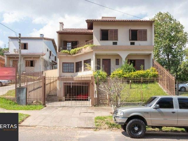 Casa / Sobrado para Venda em Porto Alegre/RS Cristal 4 Quartos