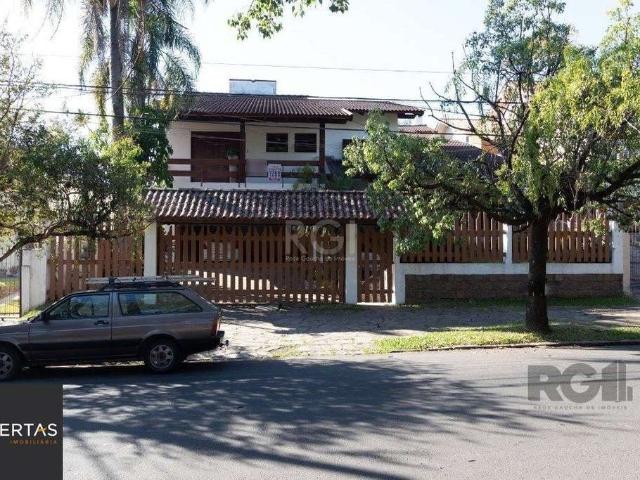 Casa / Sobrado para Venda em Porto Alegre/RS Cristal 4 Quartos