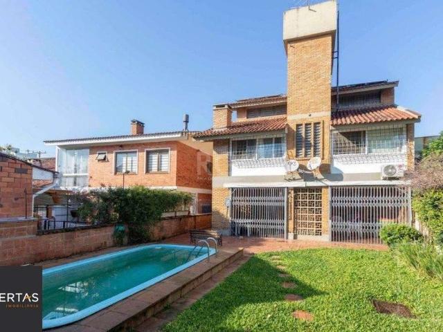 Casa / Sobrado para Venda em Porto Alegre/RS Cristal 4 Quartos