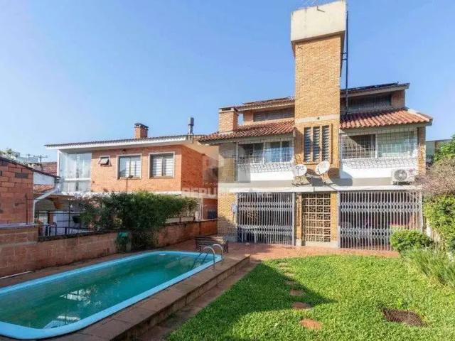 Casa / Sobrado para Venda em Porto Alegre/RS Cristal 4 Quartos