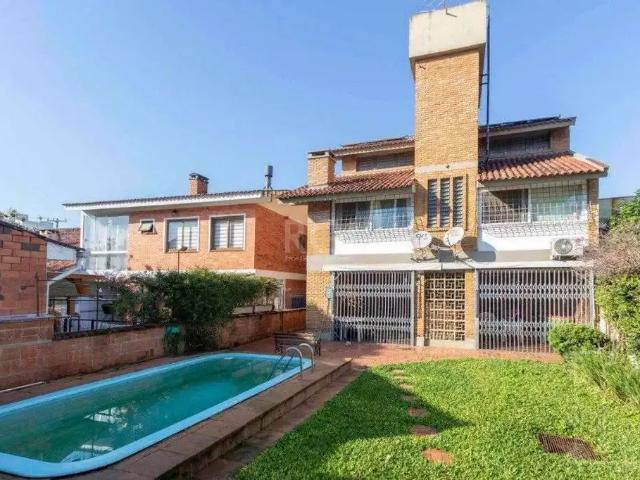 Casa / Sobrado para Venda em Porto Alegre/RS Cristal 4 Quartos