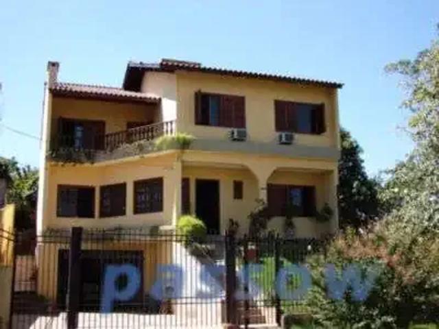 Casa / Sobrado para Venda em Porto Alegre/RS Cristal 4 Quartos
