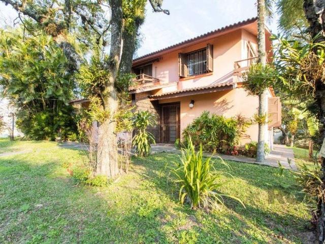 Casa / Sobrado para Venda em Porto Alegre/RS Cristal 4 Quartos