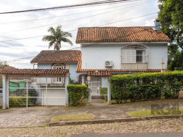 Casa / Sobrado para Venda em Porto Alegre/RS Cristal 4 Quartos