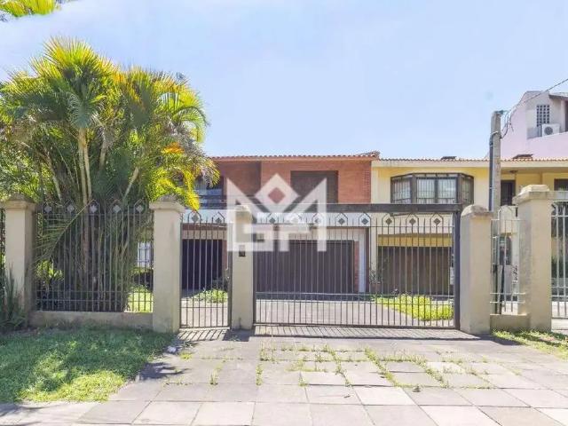 Casa / Sobrado para Venda em Porto Alegre/RS Cristal 4 Quartos