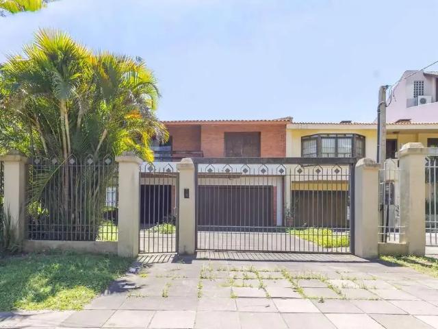 Casa / Sobrado para Venda em Porto Alegre/RS Cristal 4 Quartos