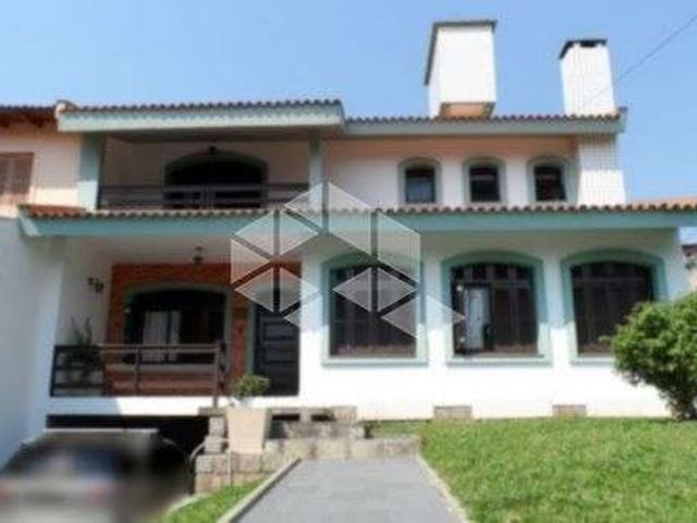 Casa / Sobrado para Venda em Porto Alegre/RS Cristal 5 Quartos