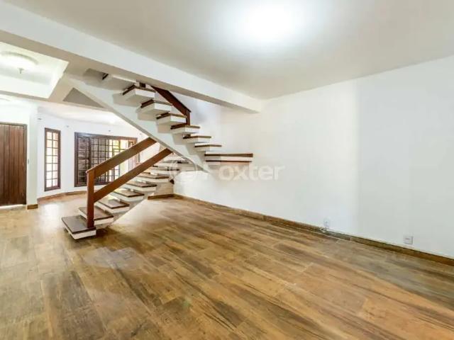 Casa / Sobrado para Venda em Porto Alegre/RS Guarujá 3 Quartos