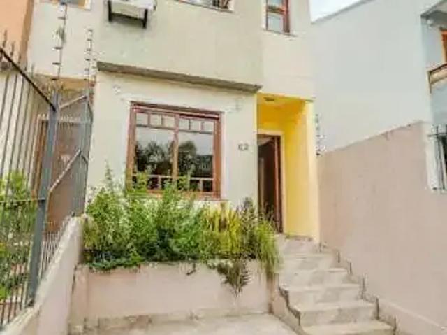Casa / Sobrado para Venda em Porto Alegre/RS Guarujá 3 Quartos
