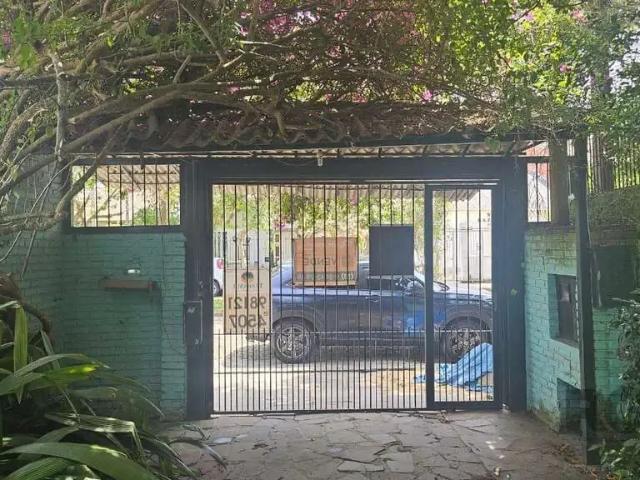 Casa / Sobrado para Venda em Porto Alegre/RS Guarujá 3 Quartos