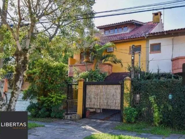 Casa / Sobrado para Venda em Porto Alegre/RS Guarujá 3 Quartos