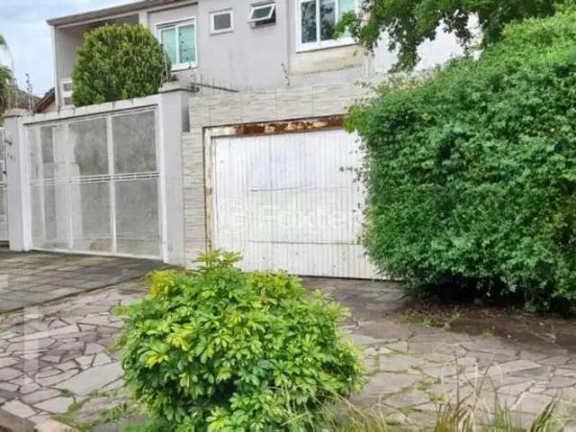 Casa / Sobrado para Venda em Porto Alegre/RS Guarujá 3 Quartos