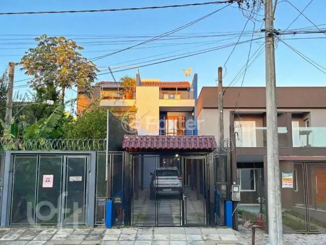Casa / Sobrado para Venda em Porto Alegre/RS Guarujá 3 Quartos