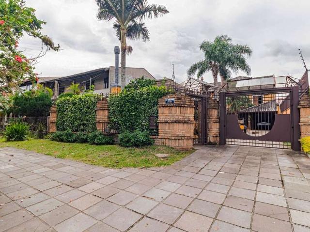 Casa / Sobrado para Venda em Porto Alegre/RS Guarujá 3 Quartos