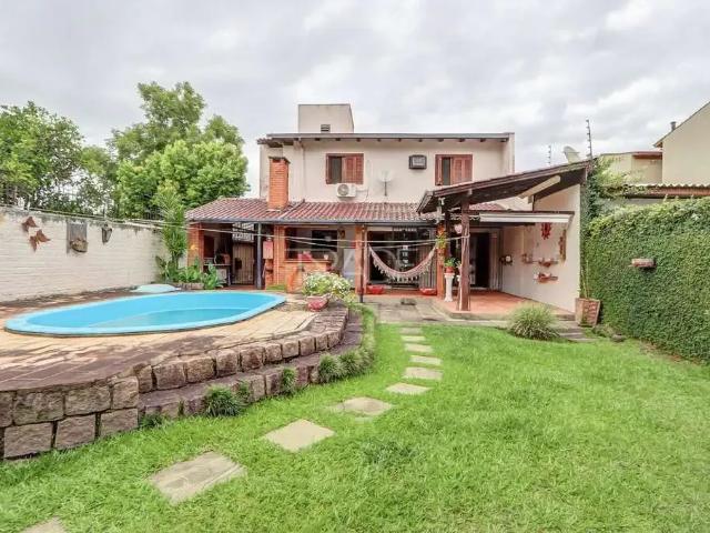 Casa / Sobrado para Venda em Porto Alegre/RS Guarujá 3 Quartos