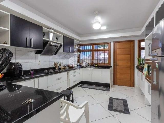 Casa / Sobrado para Venda em Porto Alegre/RS Guarujá 3 Quartos