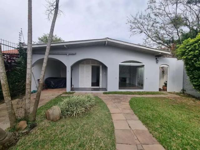 Casa / Sobrado para Venda em Porto Alegre/RS Guarujá 3 Quartos