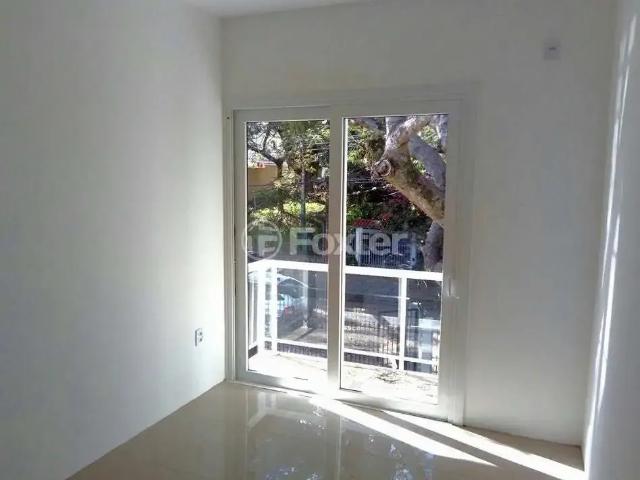 Casa / Sobrado para Venda em Porto Alegre/RS Guarujá 3 Quartos