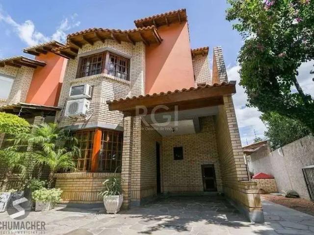 Casa / Sobrado para Venda em Porto Alegre/RS Guarujá 3 Quartos