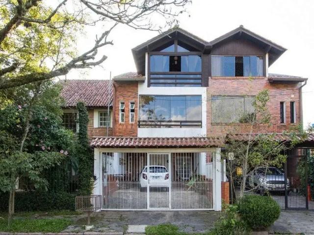 Casa / Sobrado para Venda em Porto Alegre/RS Guarujá 3 Quartos