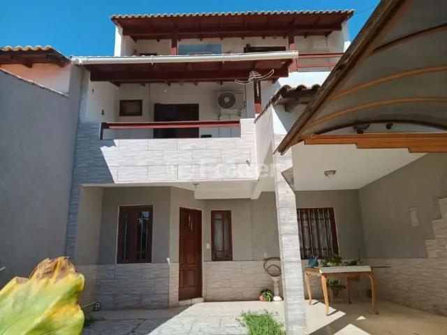 Casa / Sobrado para Venda em Porto Alegre/RS Guarujá 3 Quartos