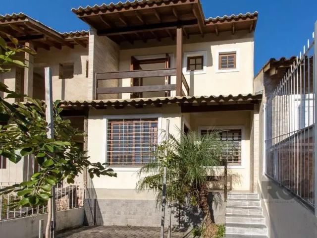 Casa / Sobrado para Venda em Porto Alegre/RS Guarujá 3 Quartos