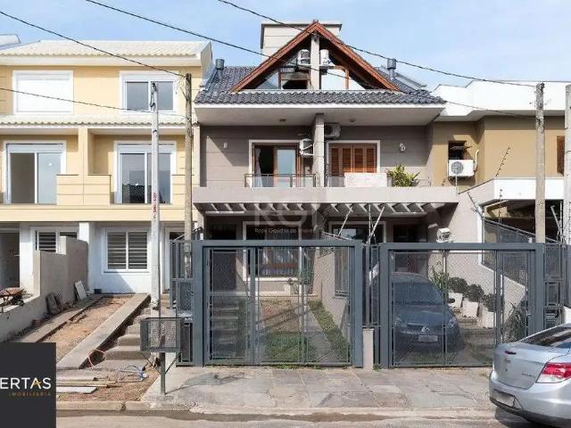 Casa / Sobrado para Venda em Porto Alegre/RS Guarujá 3 Quartos