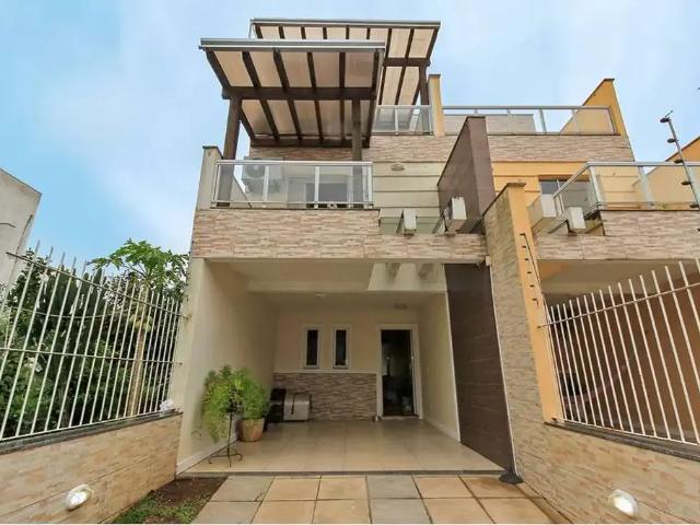 Casa / Sobrado para Venda em Porto Alegre/RS Guarujá 3 Quartos