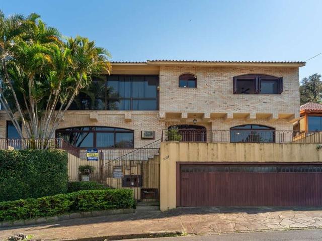 Casa / Sobrado para Venda em Porto Alegre/RS Guarujá 3 Quartos