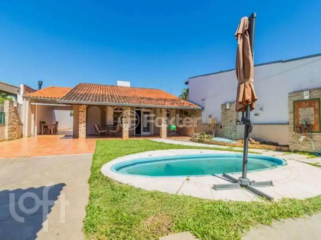 Casa / Sobrado para Venda em Porto Alegre/RS Guarujá 4 Quartos