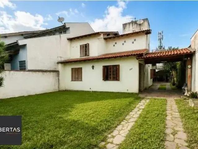 Casa / Sobrado para Venda em Porto Alegre/RS Guarujá 4 Quartos
