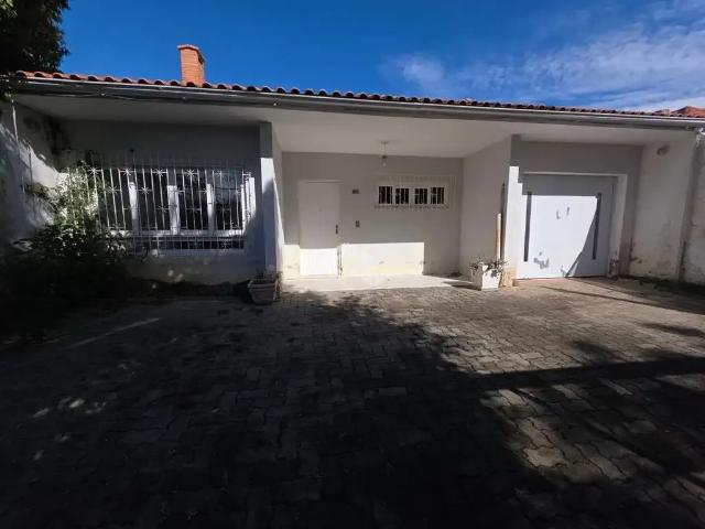Casa / Sobrado para Venda em Porto Alegre/RS Guarujá 4 Quartos
