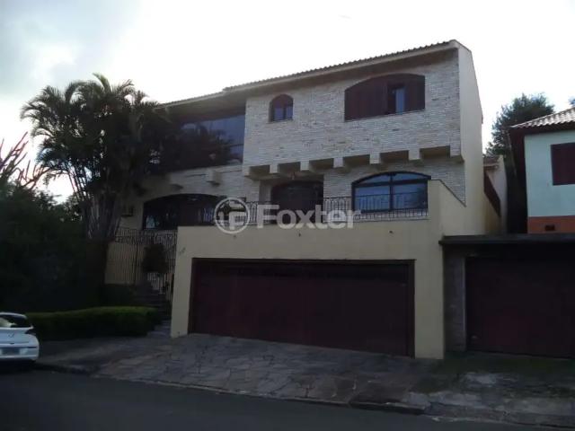 Casa / Sobrado para Venda em Porto Alegre/RS Guarujá 4 Quartos