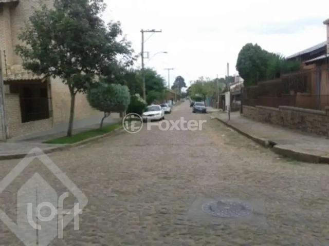 Casa / Sobrado para Venda em Porto Alegre/RS Guarujá 4 Quartos