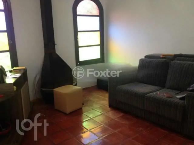 Casa / Sobrado para Venda em Porto Alegre/RS Guarujá 4 Quartos
