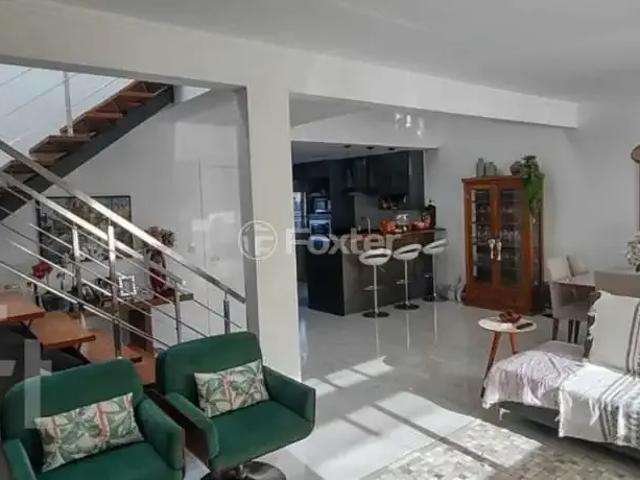 Casa / Sobrado para Venda em Porto Alegre/RS Guarujá 4 Quartos