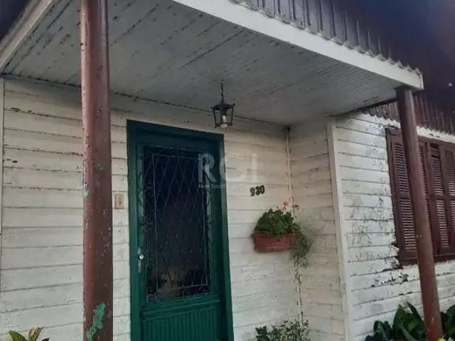 Casa / Sobrado para Venda em Porto Alegre/RS Guarujá 4 Quartos