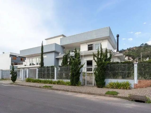 Casa / Sobrado para Venda em Porto Alegre/RS Guarujá 4 Quartos