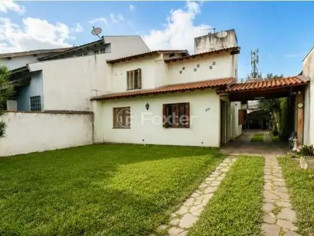 Casa / Sobrado para Venda em Porto Alegre/RS Guarujá 4 Quartos