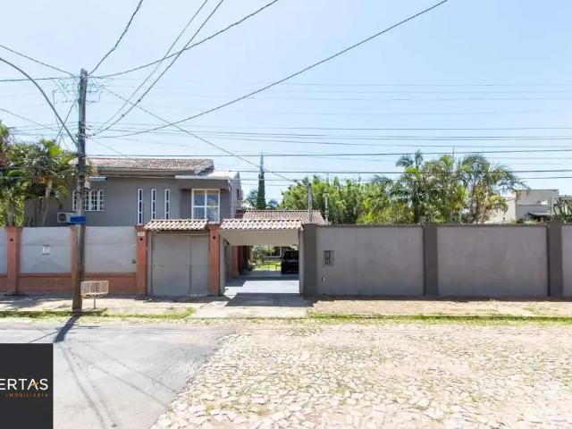 Casa / Sobrado para Venda em Porto Alegre/RS Guarujá 4 Quartos