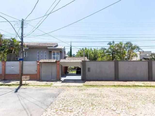 Casa / Sobrado para Venda em Porto Alegre/RS Guarujá 4 Quartos