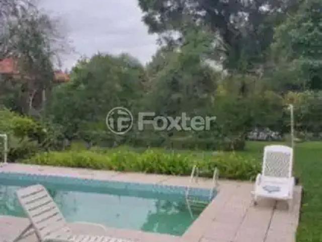 Casa / Sobrado para Venda em Porto Alegre/RS Guarujá 5 Quartos