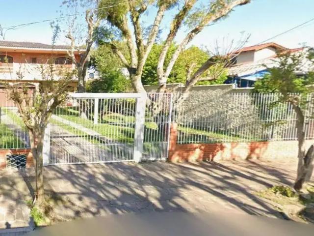 Casa / Sobrado para Venda em Porto Alegre/RS Guarujá 5 Quartos