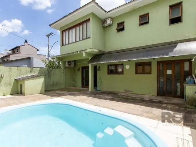 Casa / Sobrado para Venda em Porto Alegre/RS Hípica 3 Quartos