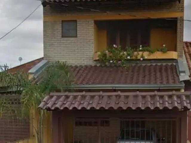Casa / Sobrado para Venda em Porto Alegre/RS Hípica 3 Quartos